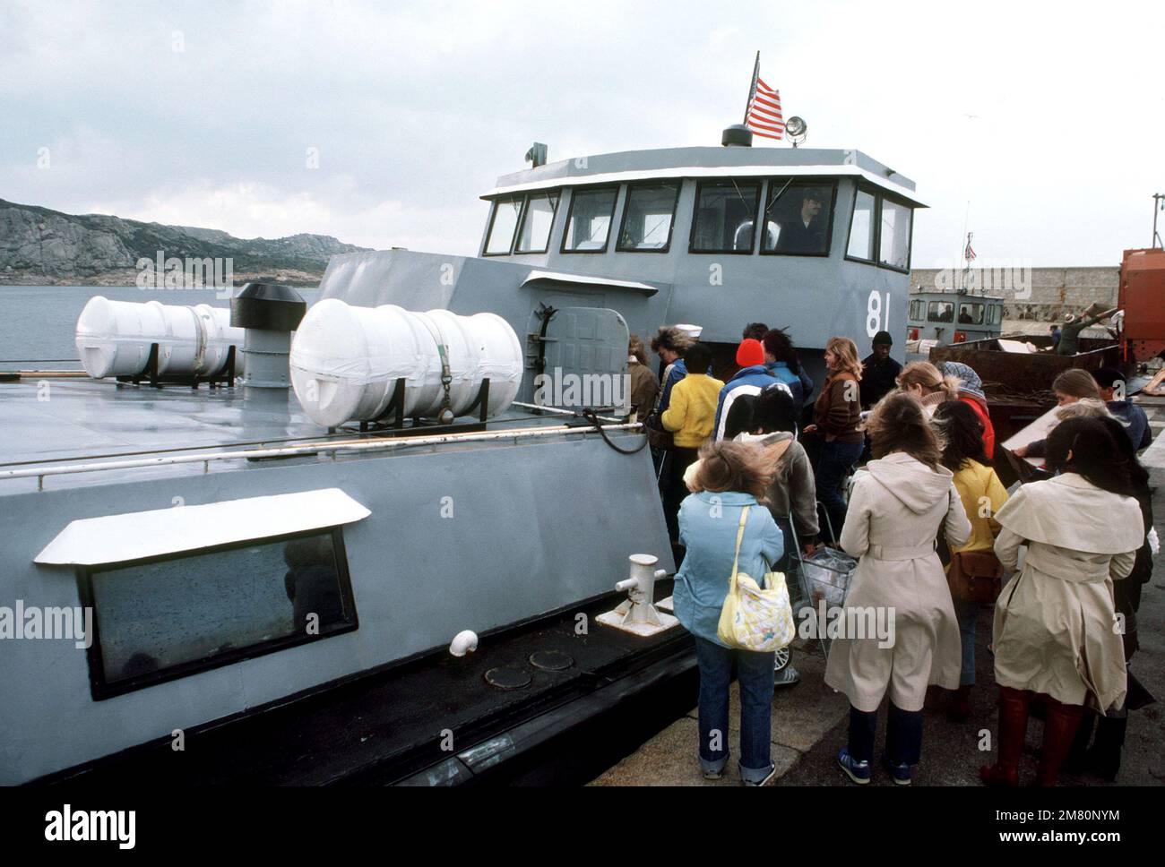 A ferry takes children to school. Base: Naval Station, La Maddalena ...