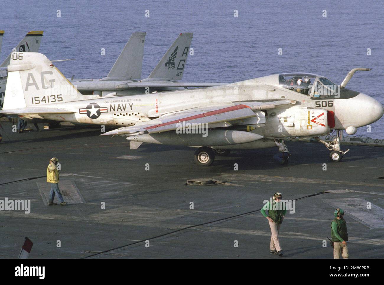 An A-6E Intruder aircraft taxis along the flight deck ofthe nuclear ...