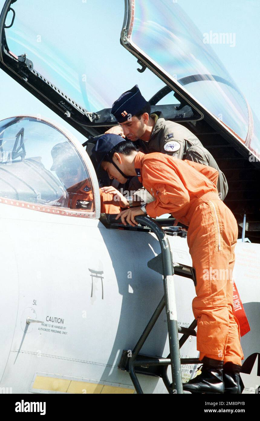 Captain Sal Speziale of the 12th Tactical Fighter Squadron familiarizes ...