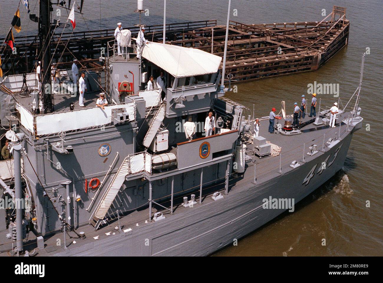 A starboard quarter view of the superstructure and forward deck of the ...