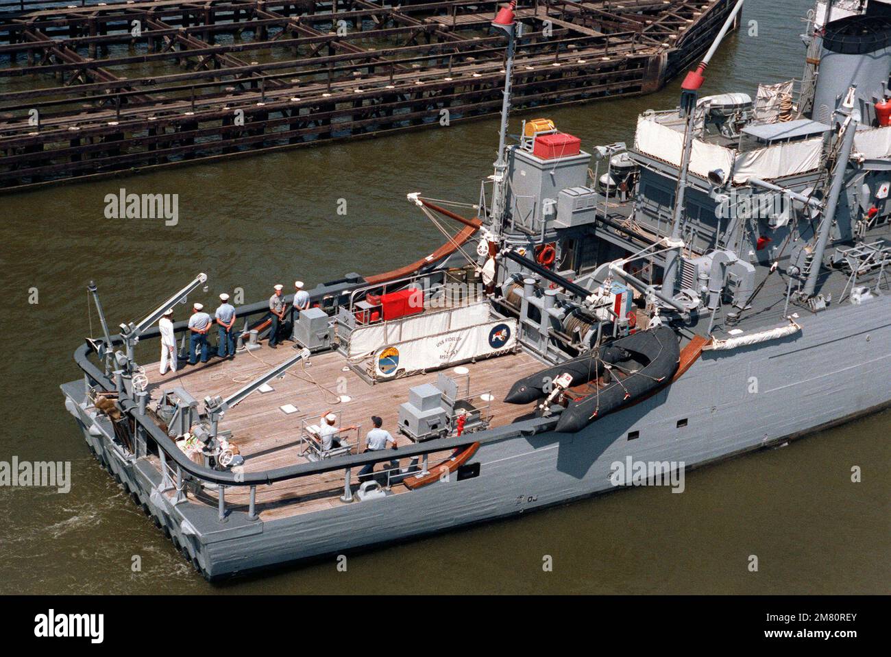 A starboard quarter view of the aft deck of the ocean minesweeper USS ...