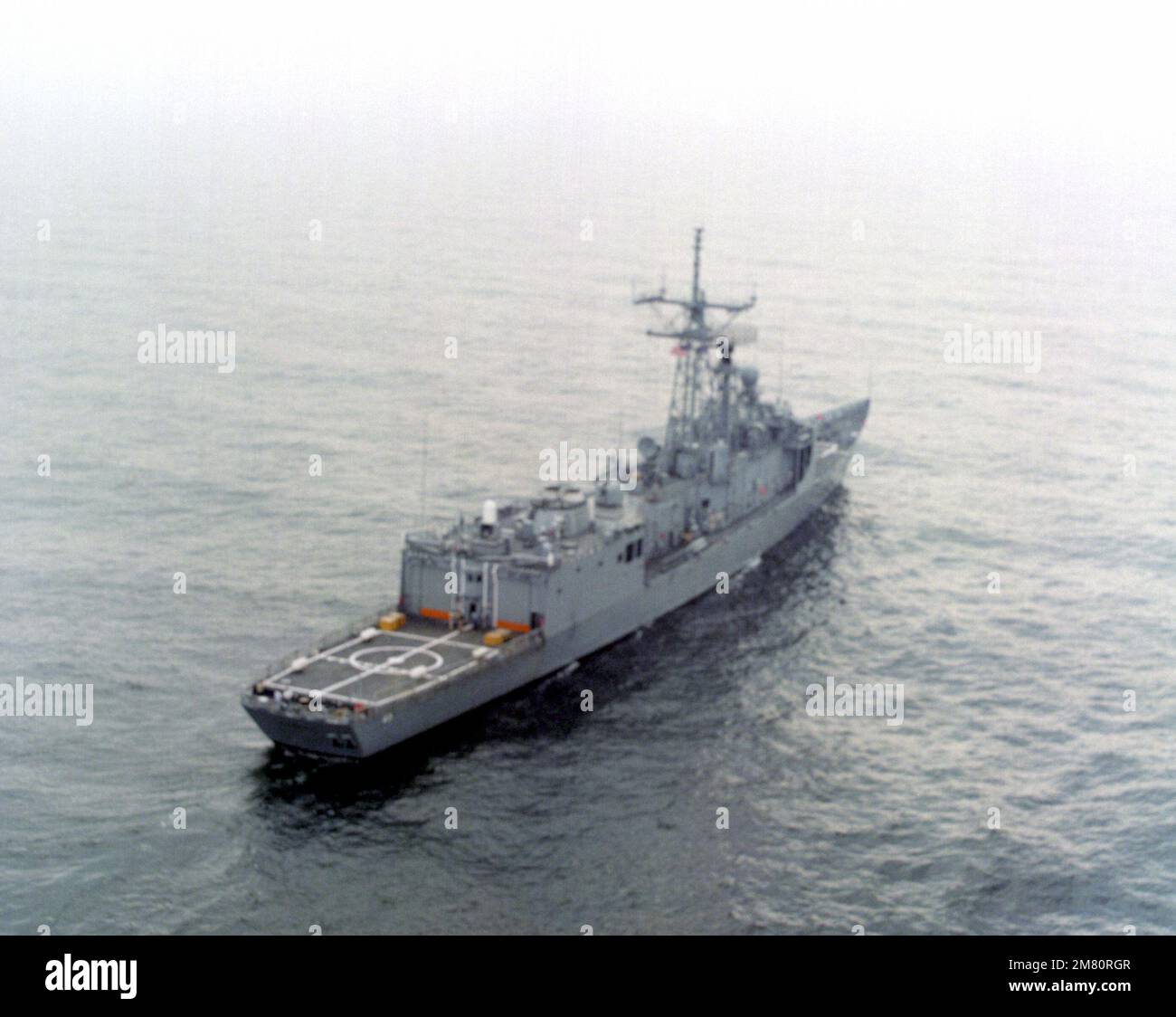 An elevated starboard quarter view of the guided missile frigate DE ...