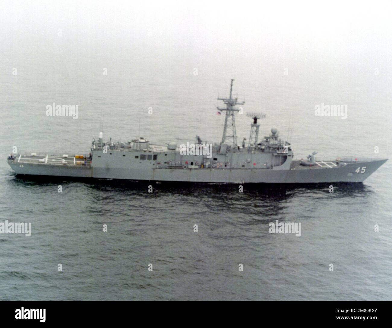 An elevated starboard beam view of the guided missile frigate DE WERT ...