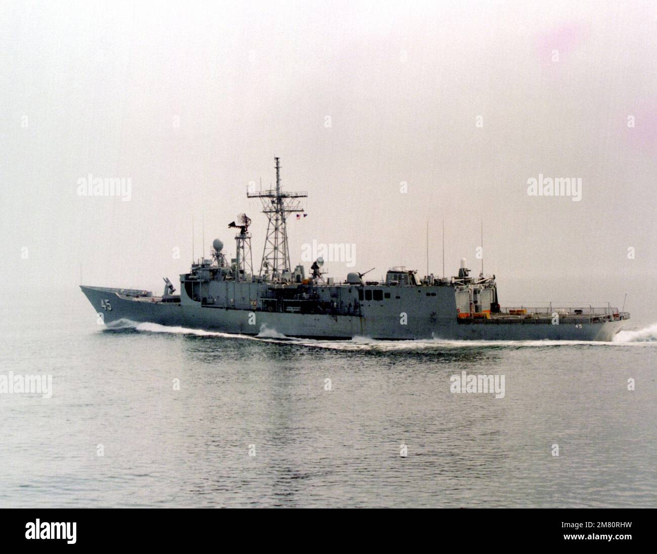 A port view of the guided missile frigate DE WERT (FFG-45) underway ...