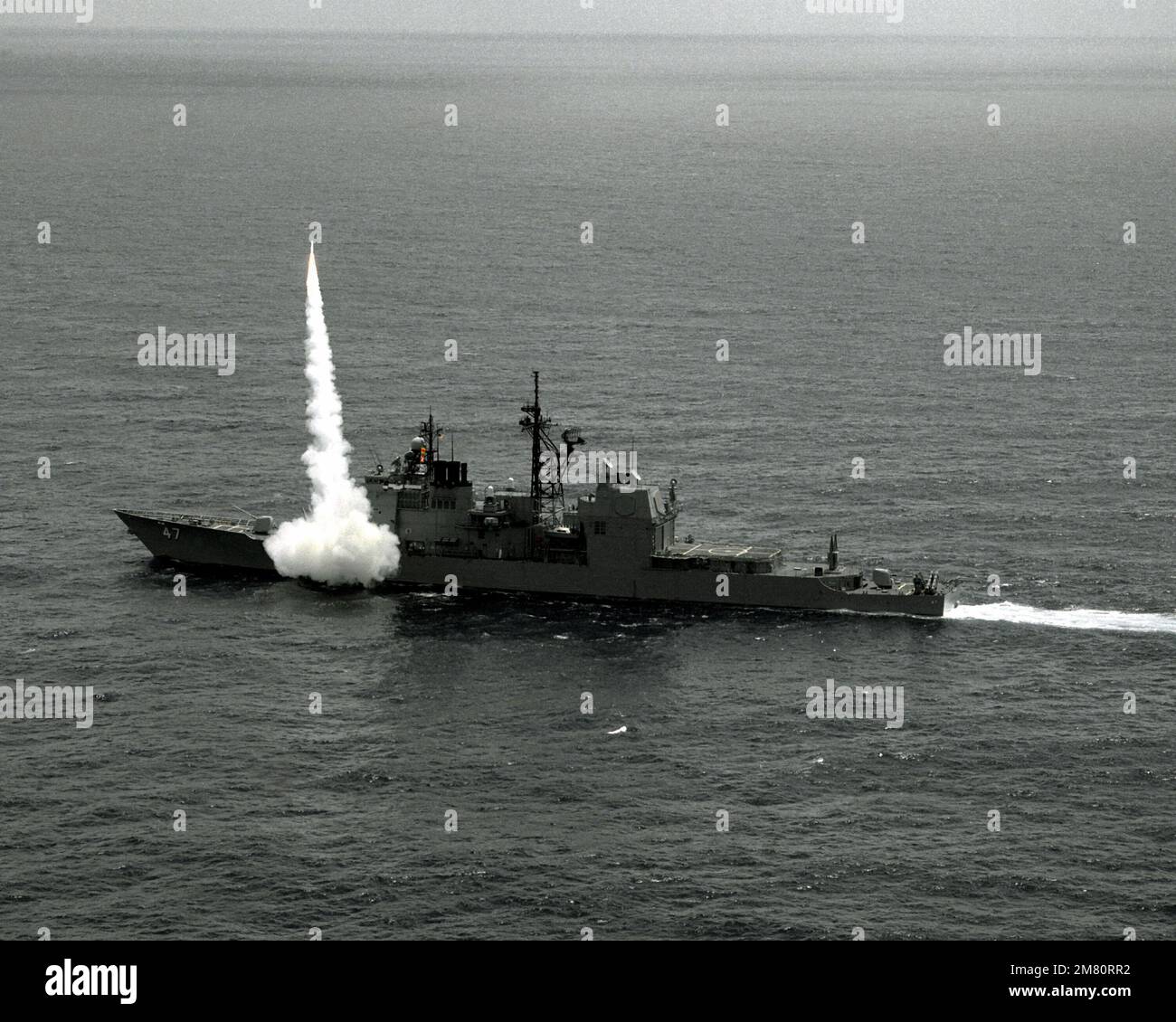 An RIM-66C Standard missile is fired from the forward Mark 26 Mod 1 ...