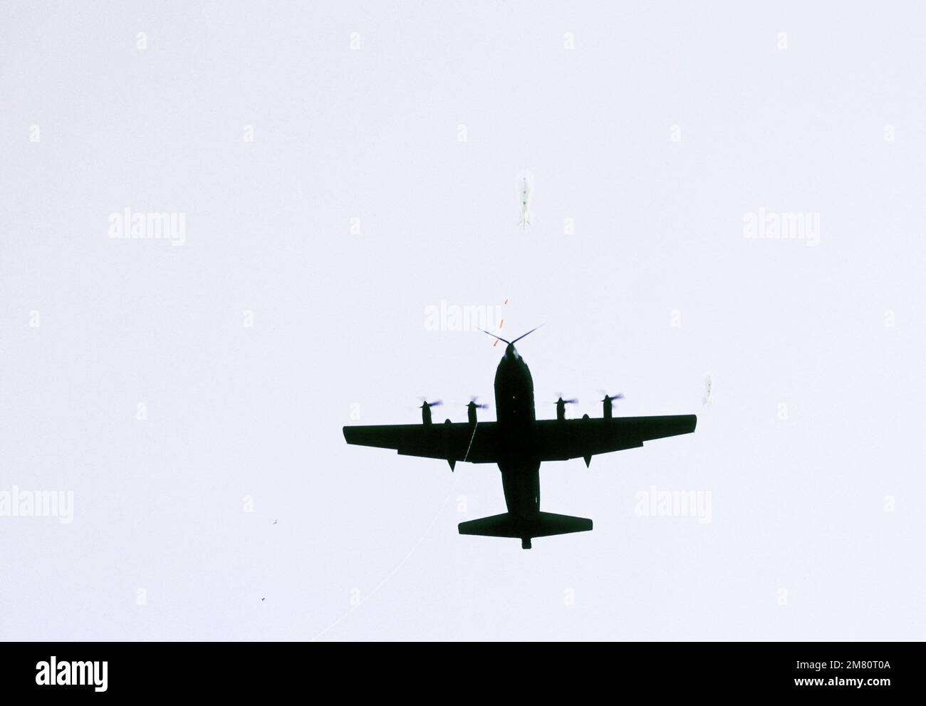 An air-to-ground view of an MC-130 Hercules aircraft from the 8th ...
