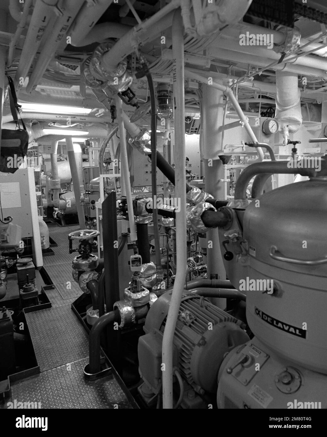 The lower level auxiliary machinery room No. 2 aboard the guided ...