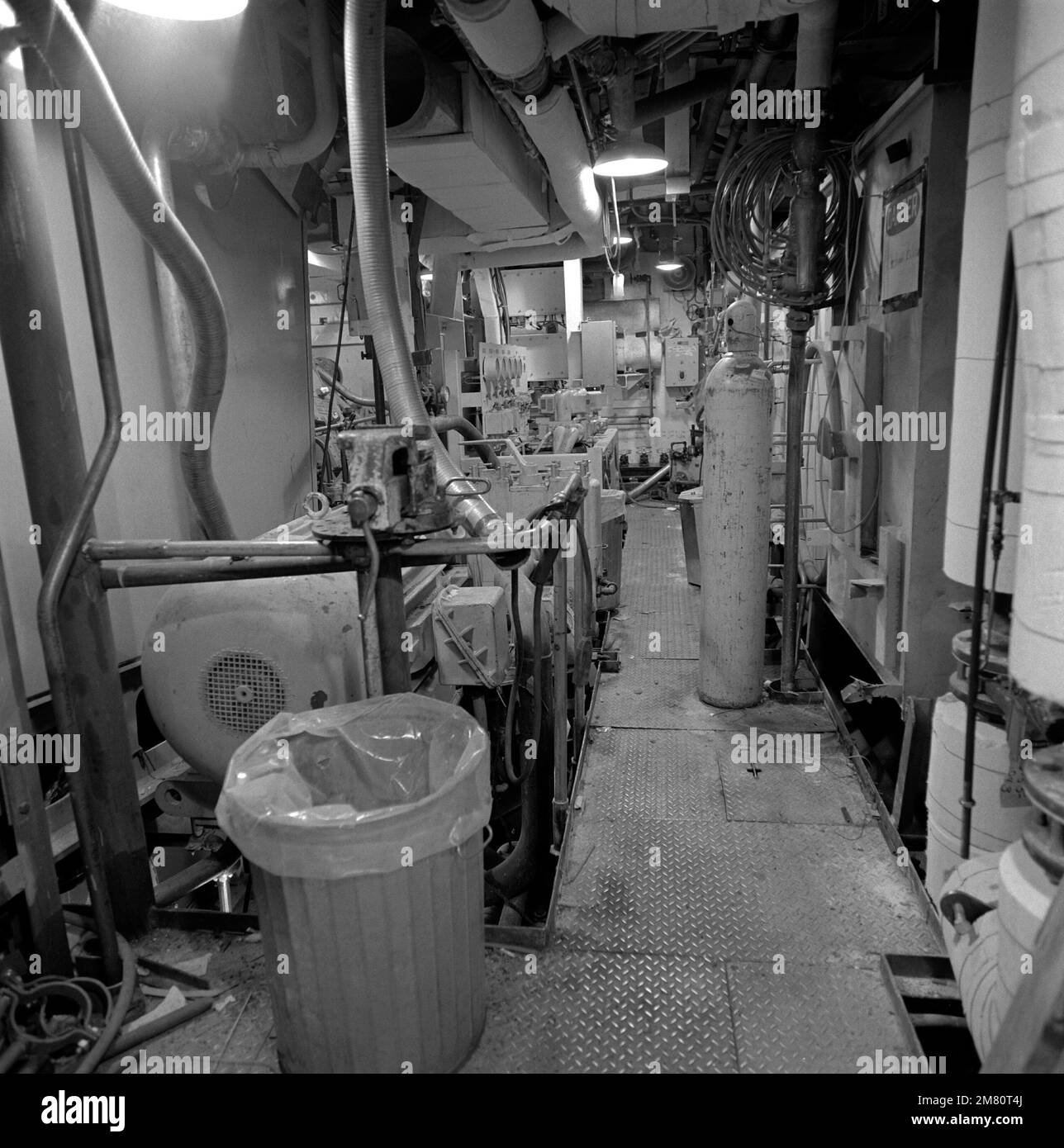 The lower level engine room aboard the guided missile frigate NICHOLAS ...
