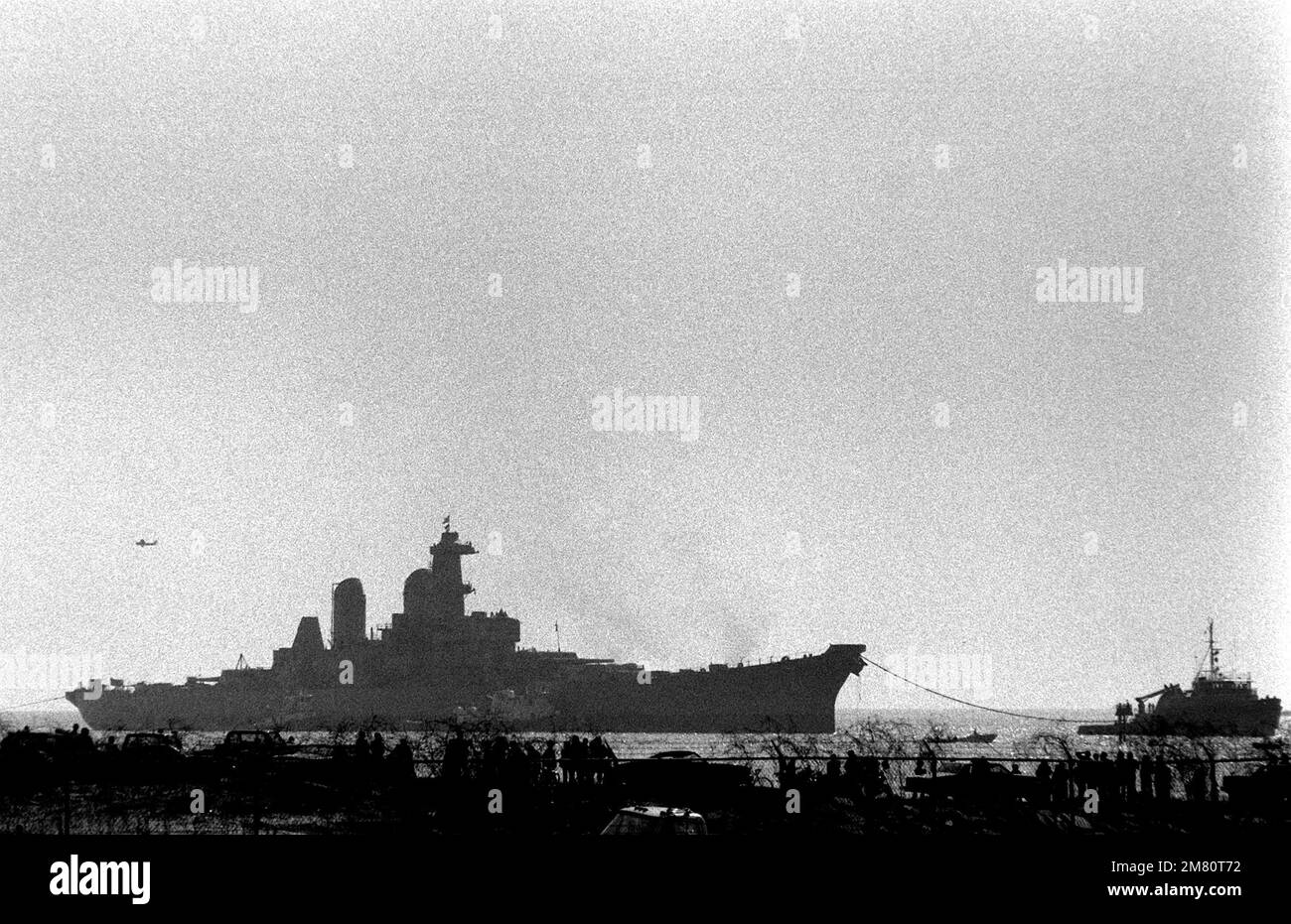 A starboard bow view of the battleship USS IOWA (BB-61) being towed ...