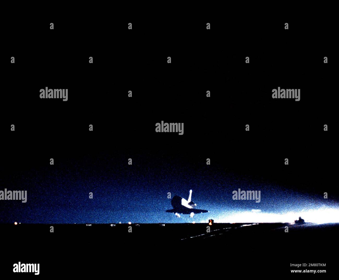 The space shuttle orbiter Challenger (STS-8) makes the first nighttime ...