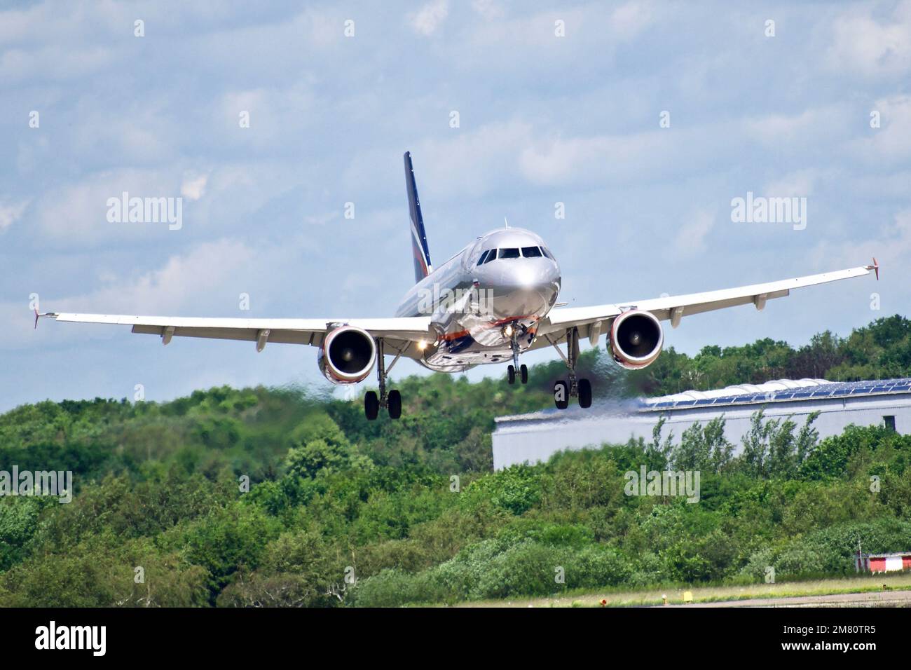 An Aeroflot Airbus A320 airplane landing in Hamburg, Germany Stock ...