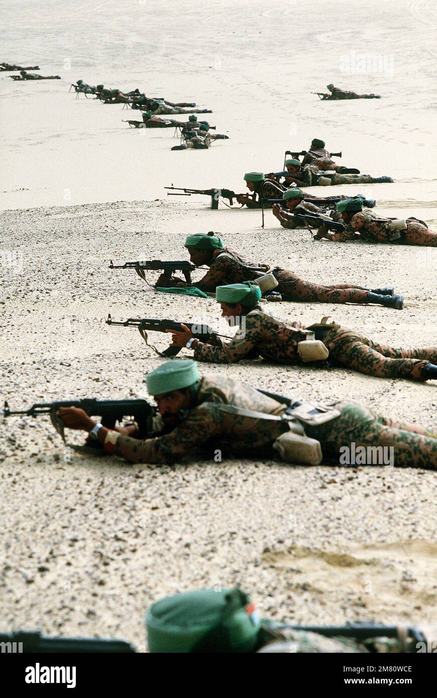 Egyptian soldiers, armed with Soviet designed AKM assault rifles ...