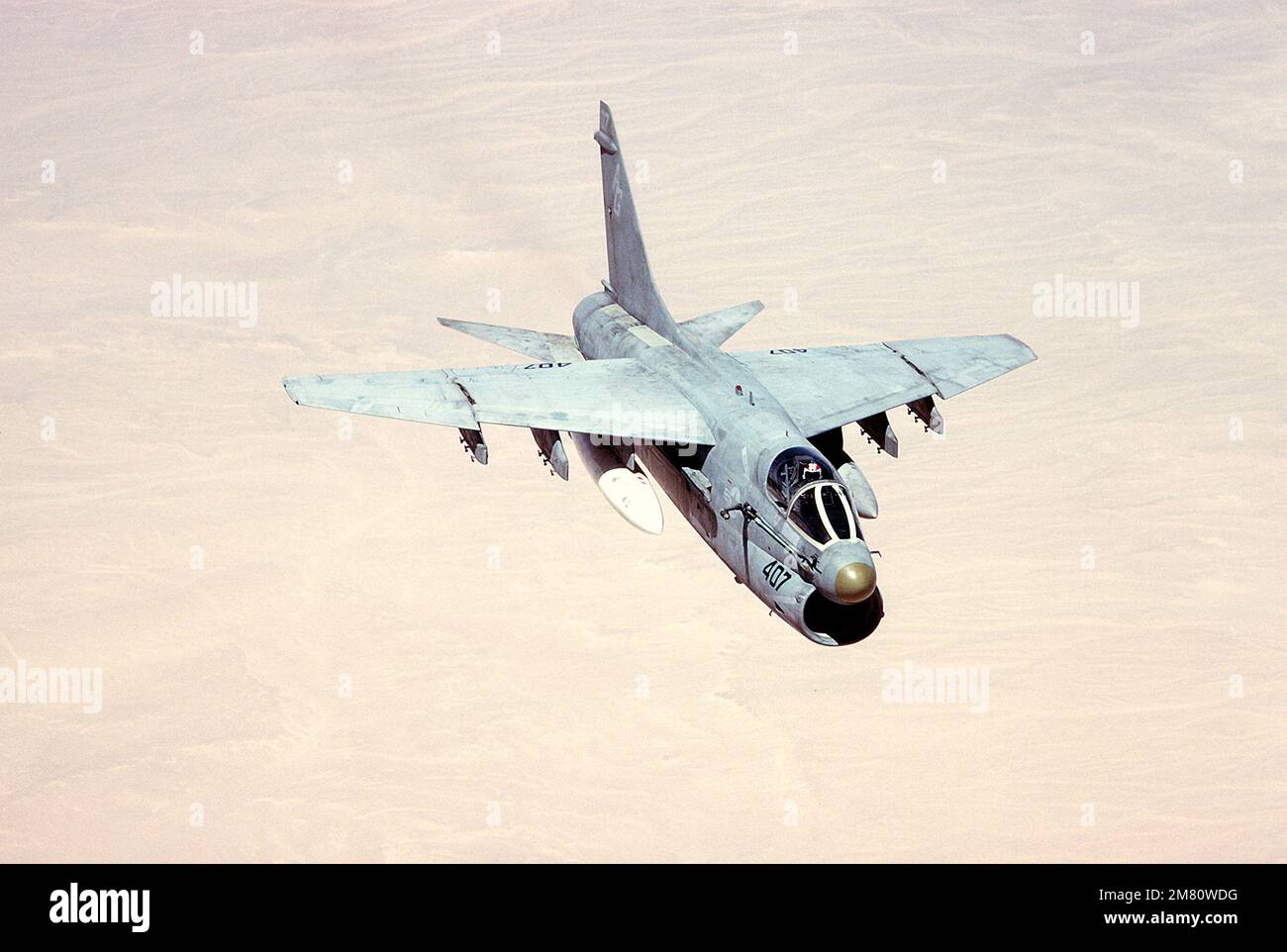 An air-to-air right front view of an A-7 Corsair II aircraft in use ...