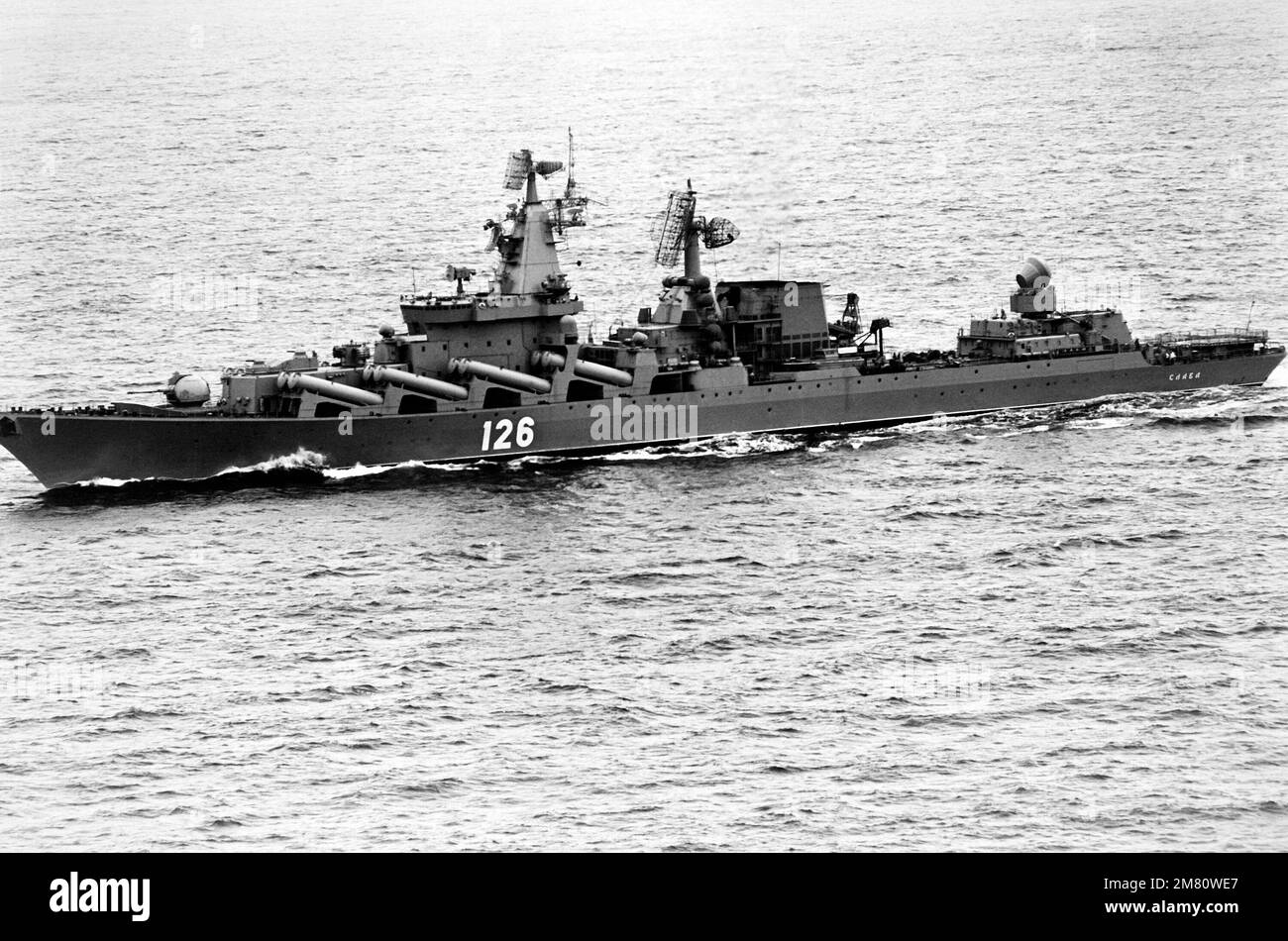 A port view of the Soviet cruiser SLAVA, the first of its class ...