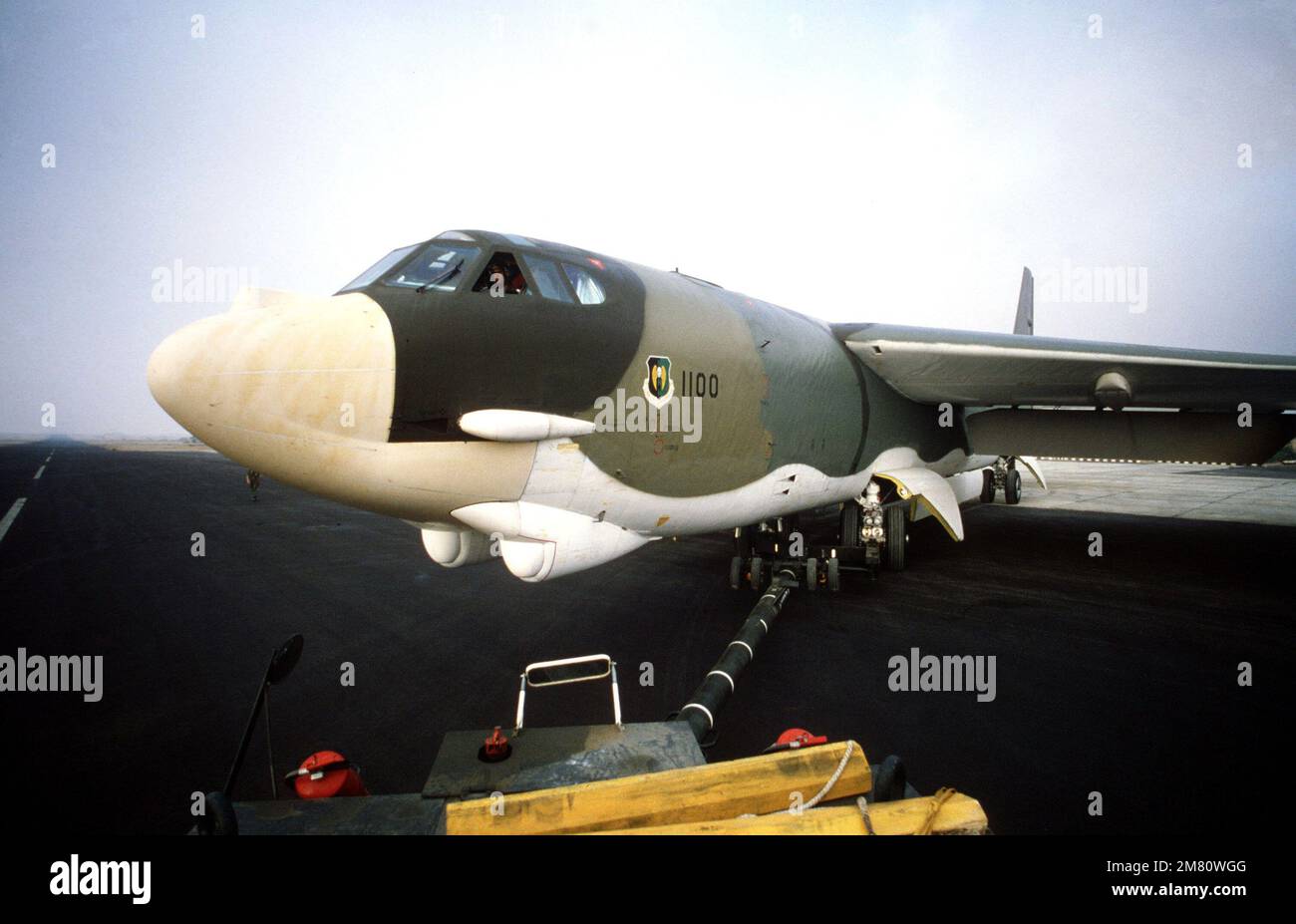 A left front view of a B-52 bomber aircraft in tow during exercise ...