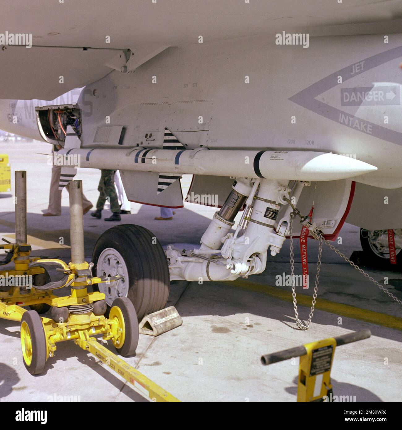 An NAIM-120A advanced medium-range air-to-air missile (AMRAAM) mounted ...