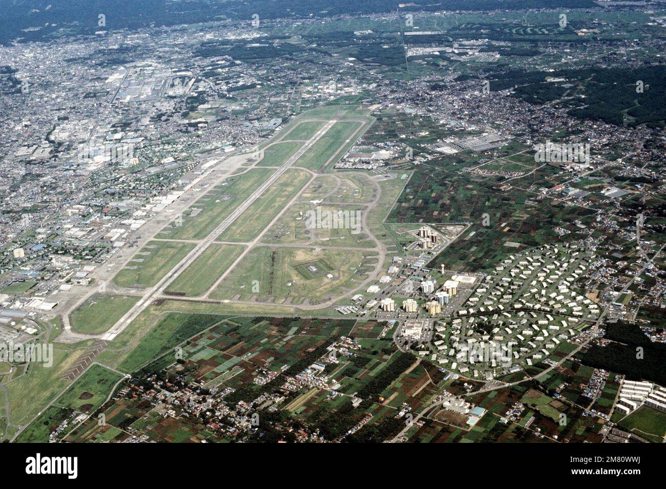 An aerial view of Yokota Air Base, Japan. Base: Yokota Air Base Country ...
