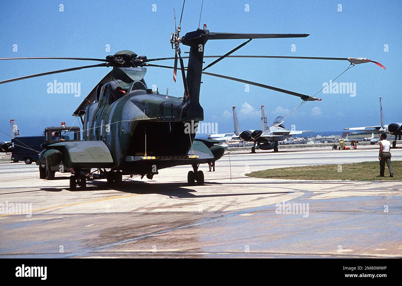 A left rear view of an HH-3E helicopter assigned to the 33rd Aerospace ...