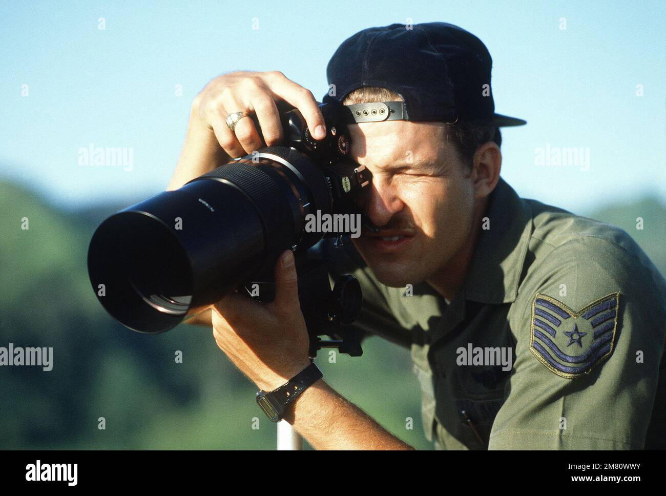 Technical Sergeant David N. Craft photographs an anti-aircraft training ...