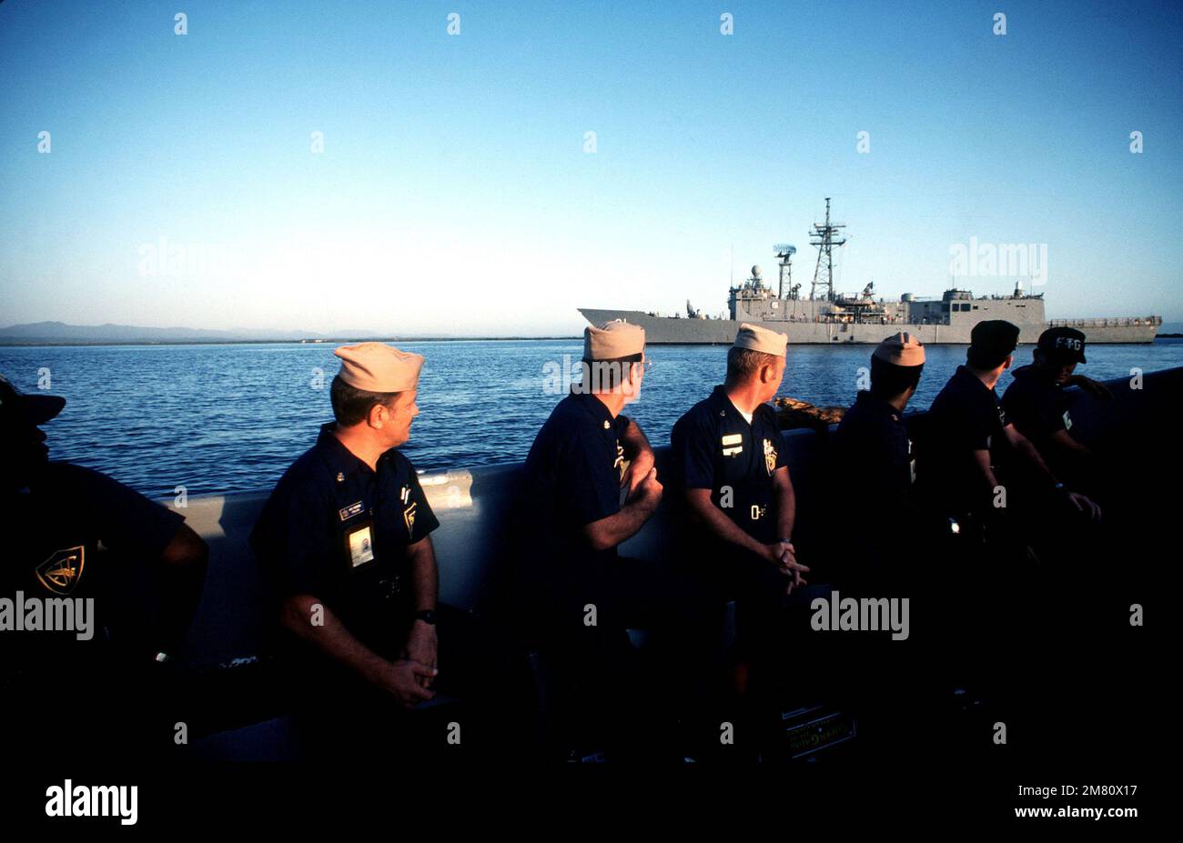 A motor whaleboat takes Fleet Training Group instructors to the guided ...