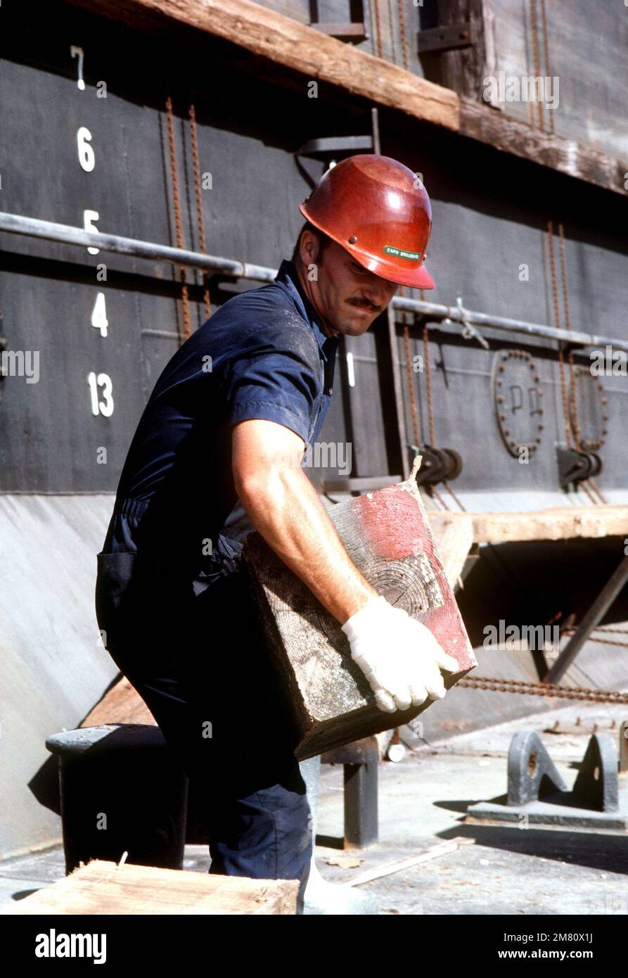 Engineman Fireman (ENFN) Stewart Broussard prepares the Shore ...