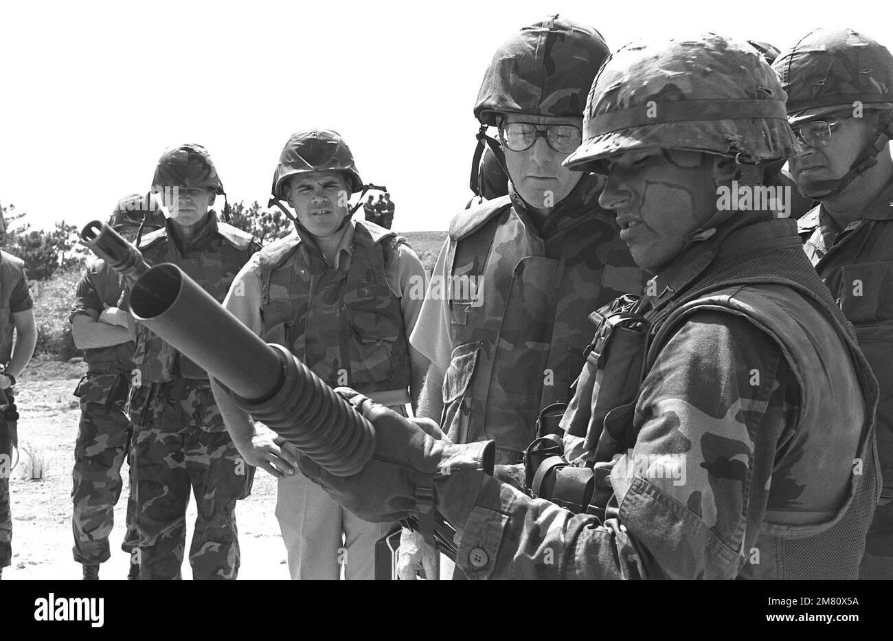A Marine explains the operation of the M-203 grenade launcher to Vice ... A Marine explains the operation of the M-203 grenade launcher to Vice ...