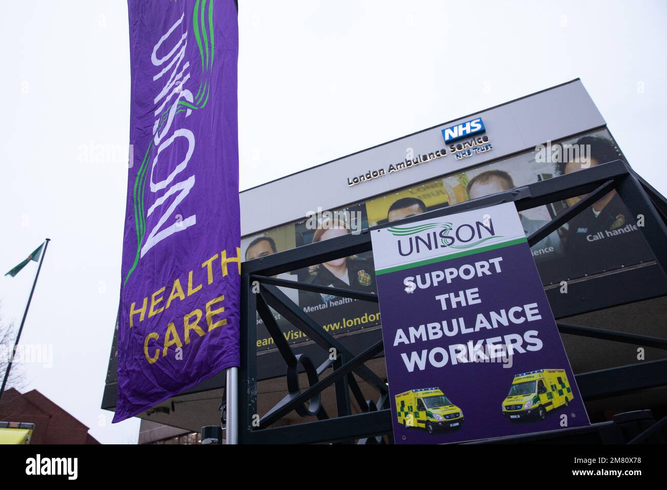 London, UK. 11 January, 2023. A UNISON trade union sign and banner are ...