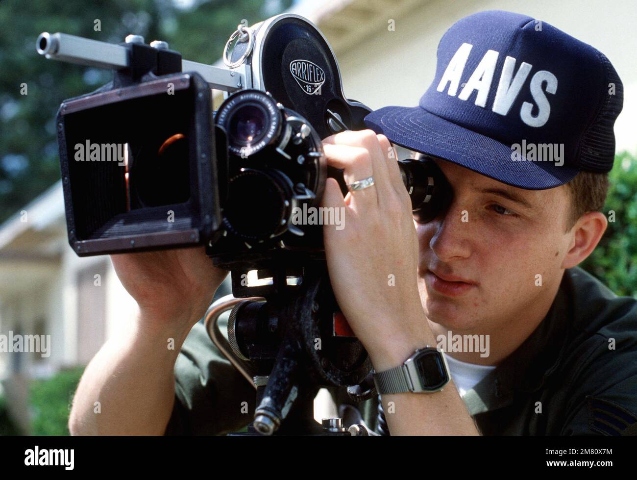 SENIOR AIRMAN Tom Donahoe operates an Arriflex-S 16mm motion picture ...