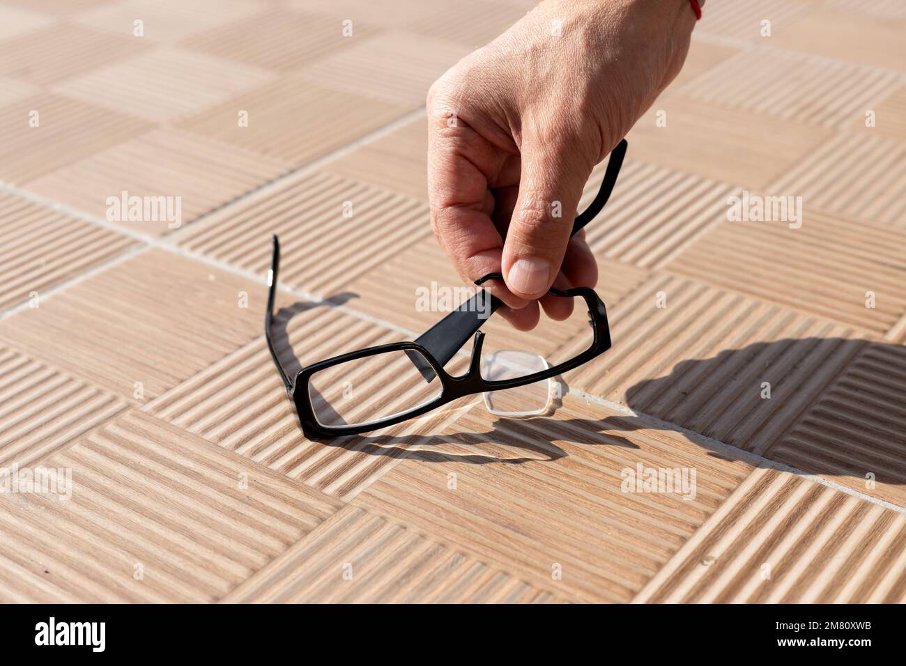 Hand broken tile hi-res stock photography and images - Alamy