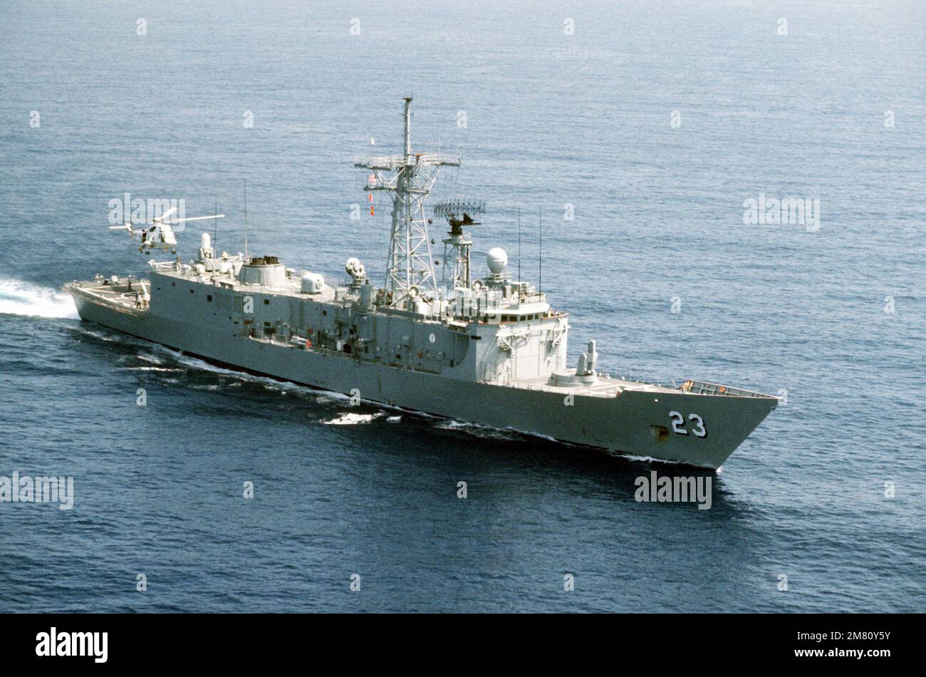 An elevated starboard bow view of the guided missile frigate USS LEWIS ...