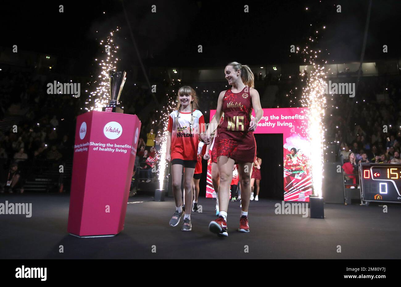 England's Natalie Metcalf leads the teams out ahead of the Vitality ...