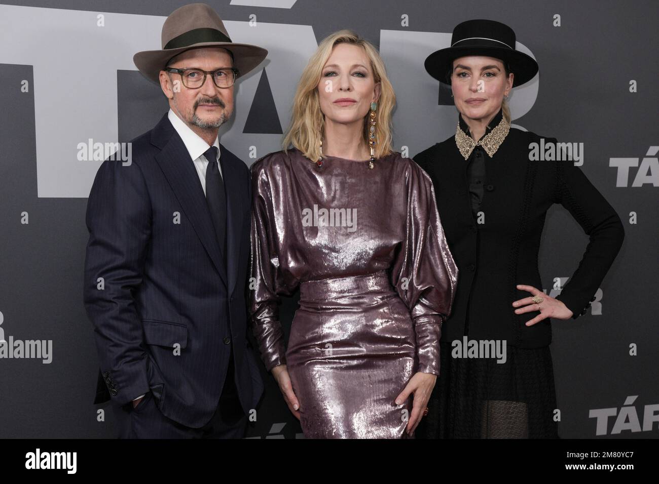 Director Todd Field, from left, Cate Blanchett, and Nina Hoss pose for photographers upon ...