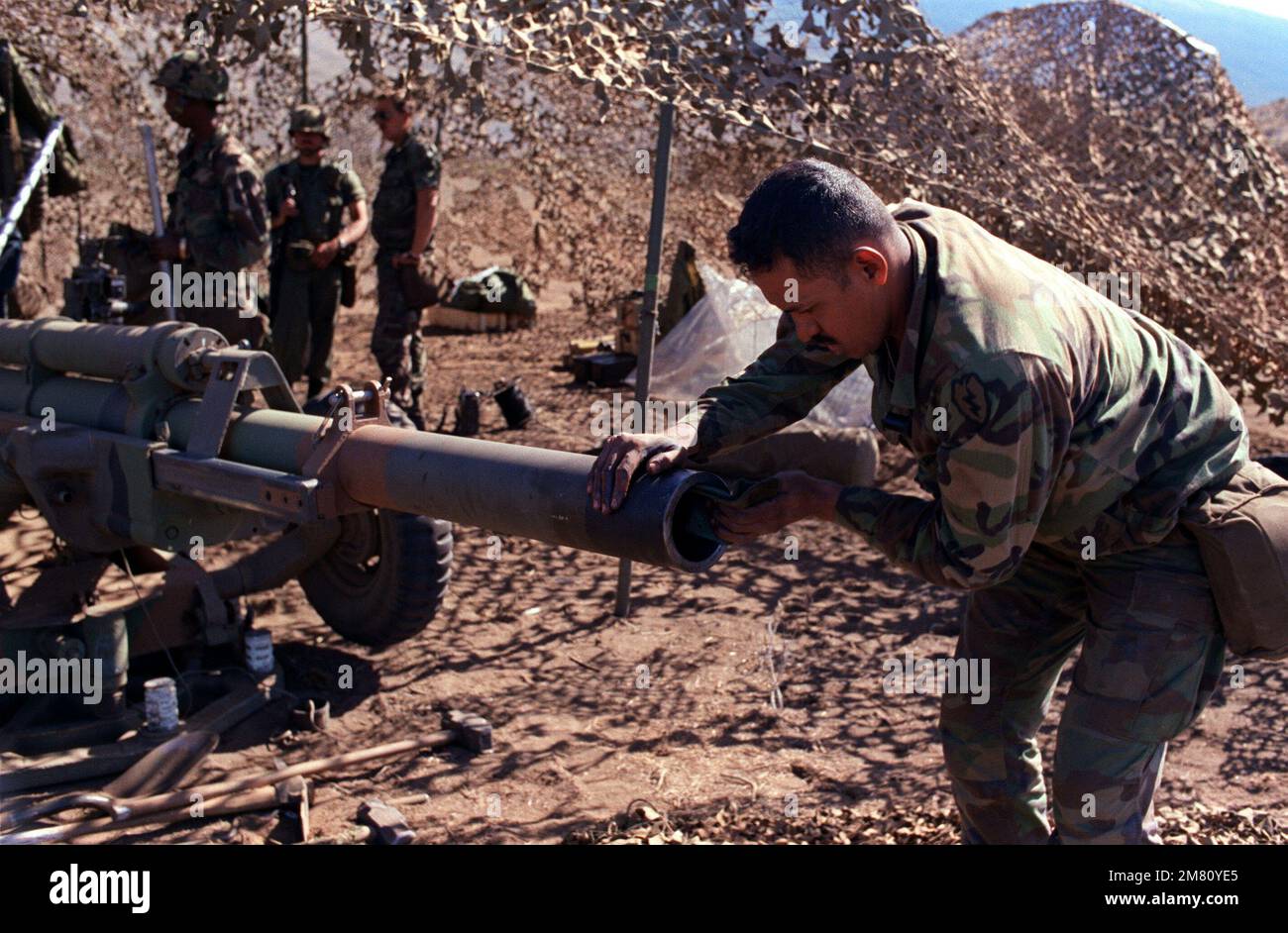 Corporal Rene Garcia, assistant gunner with the 4th Section of Battery ...