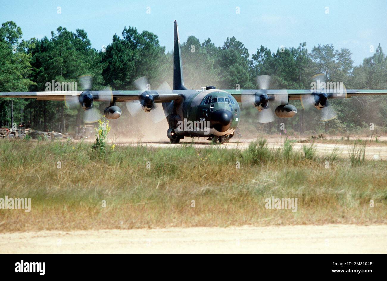 A C-130 Hercules aircraft lands at the Remagen Drop Zone, approximately ...