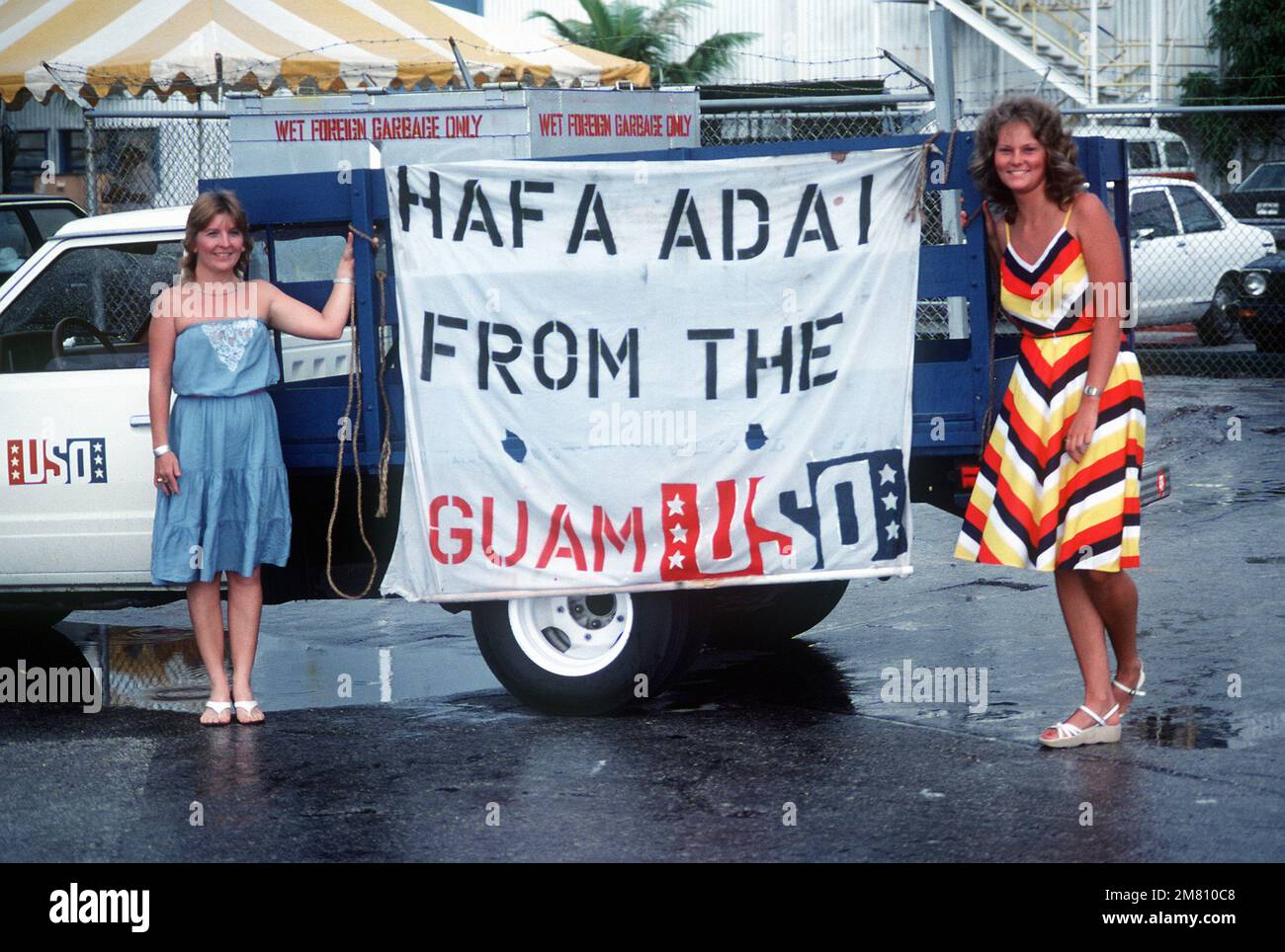 A USO sign at Naval Station Guam welcomes the crewmen of the combat ...