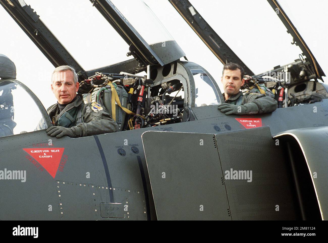 Majors Jon Alexander, left, and Daniel Silvis pose in their F-4E ...