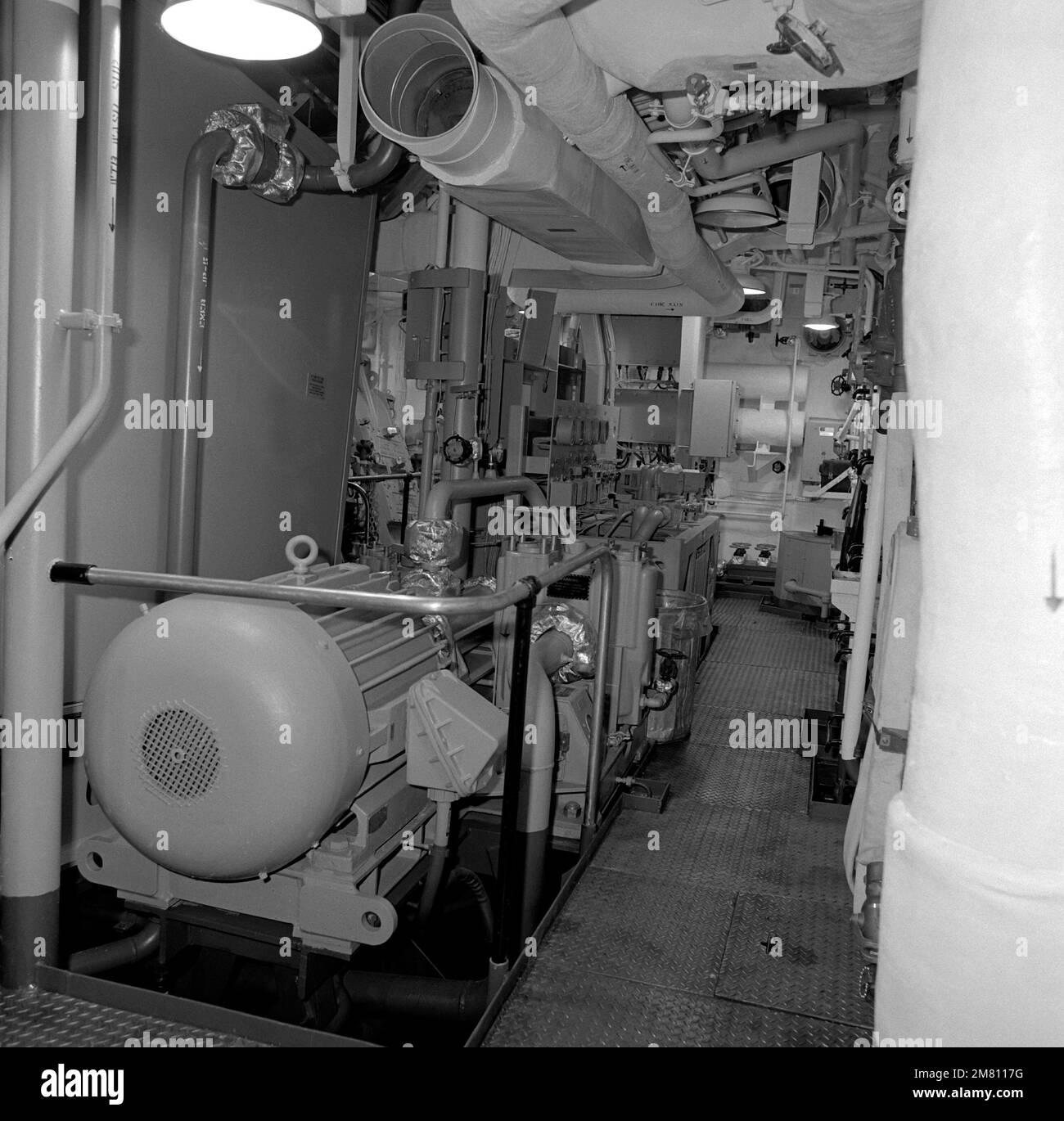 The lower level engine room aboard the guided missile frigate DE WERT ...
