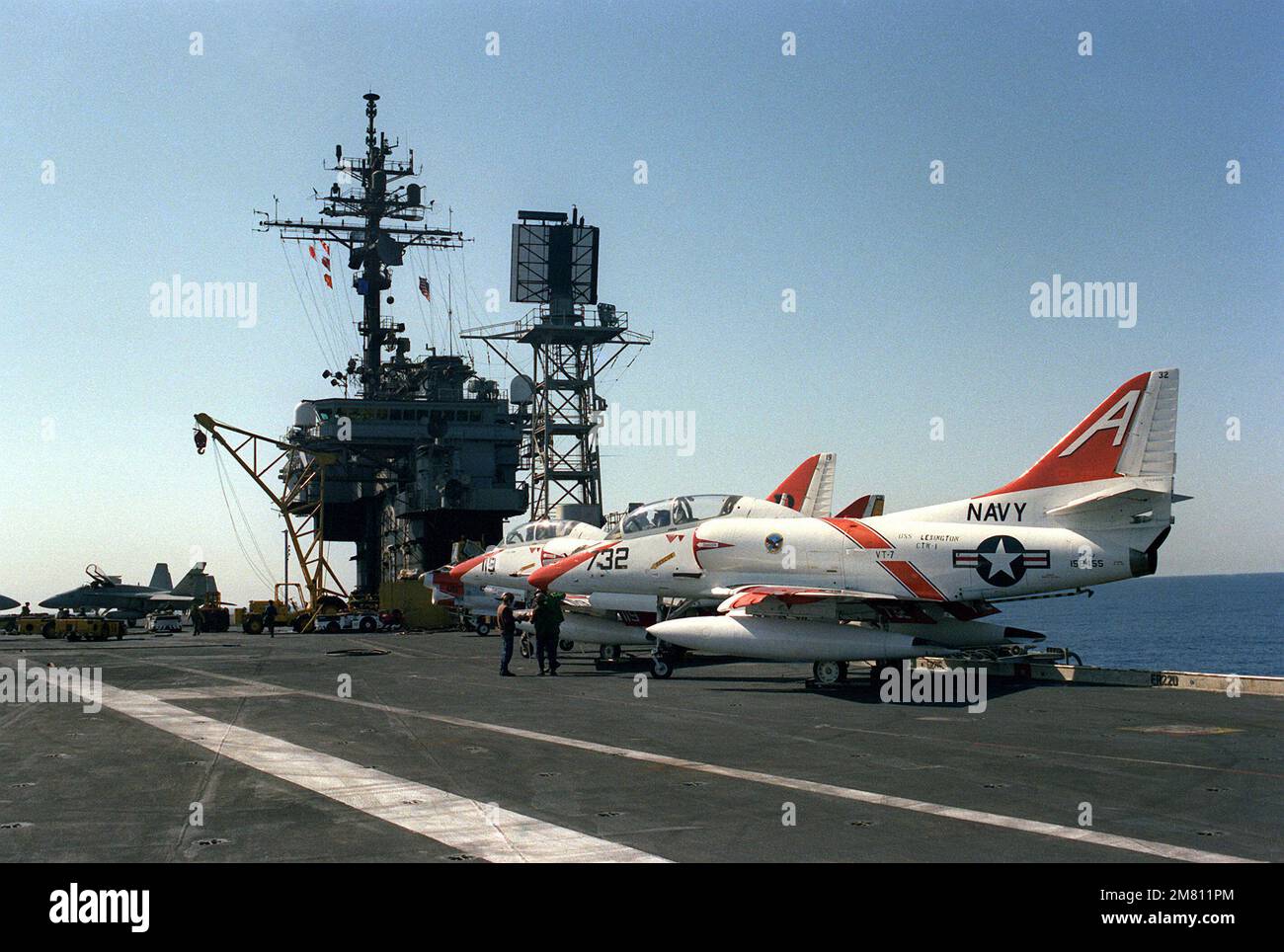 A left side view of two TA-4J Skyhawk aircraft on the flight deck of ...