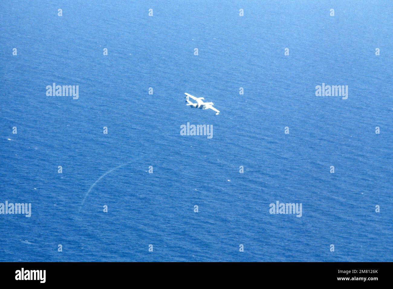 An air-to-air rear view of a Soviet Be-12 Mail aircraft. The aircraft ...