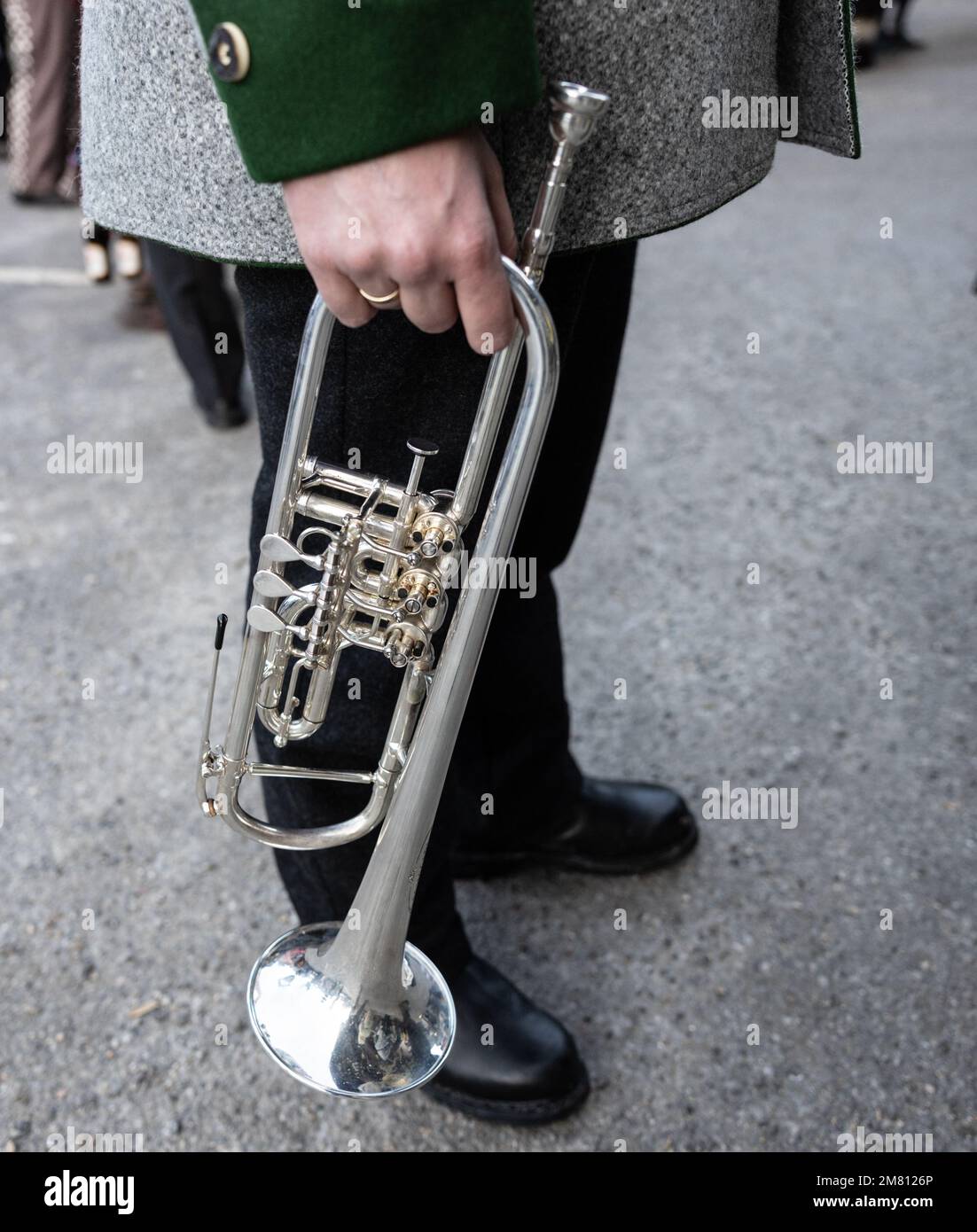 Trumpet in the hands of a musician at the perchten procession in the ...