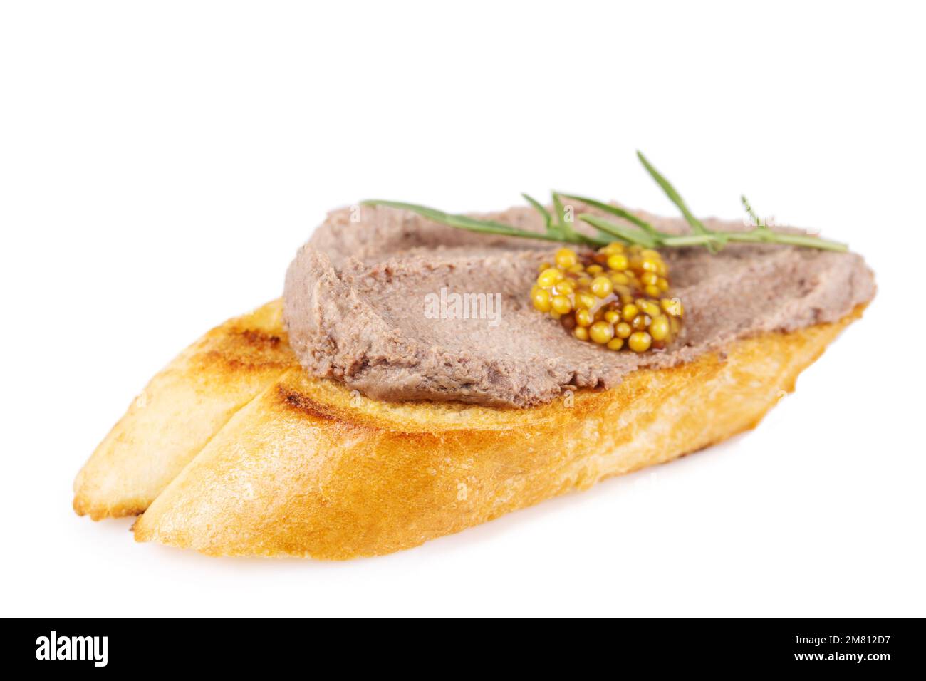 Meat pate on a baguette with Dijon mustard and arugula isolated on ...