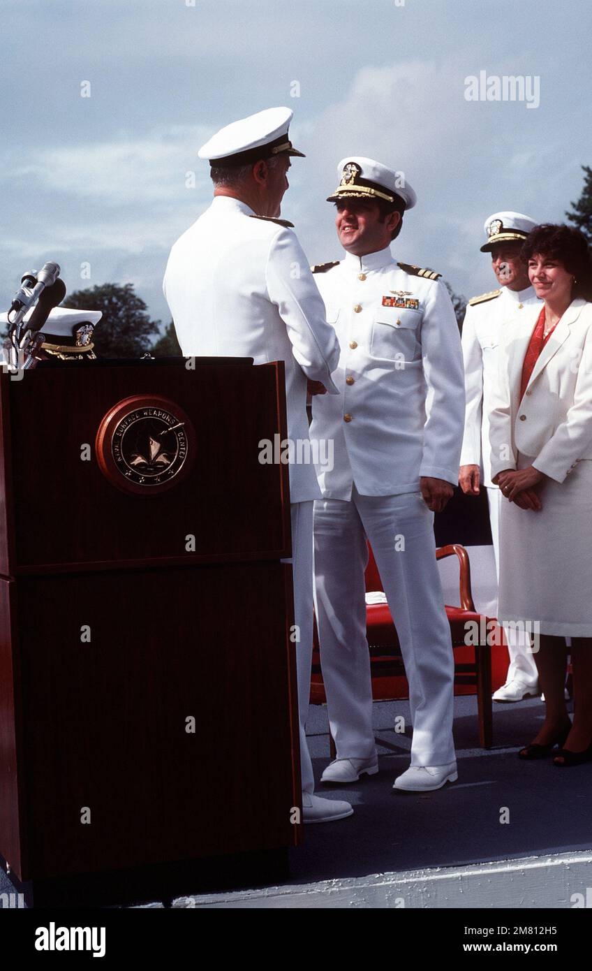 ADM James D. Watkins, left, chief of Naval Operations, shakes hands ...