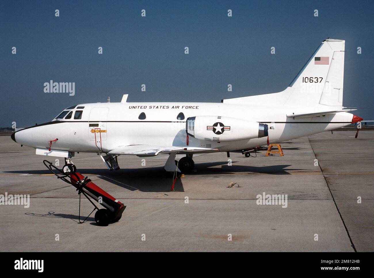 A left side view of a T-39 Sabreliner aircraft parked on the flight ...
