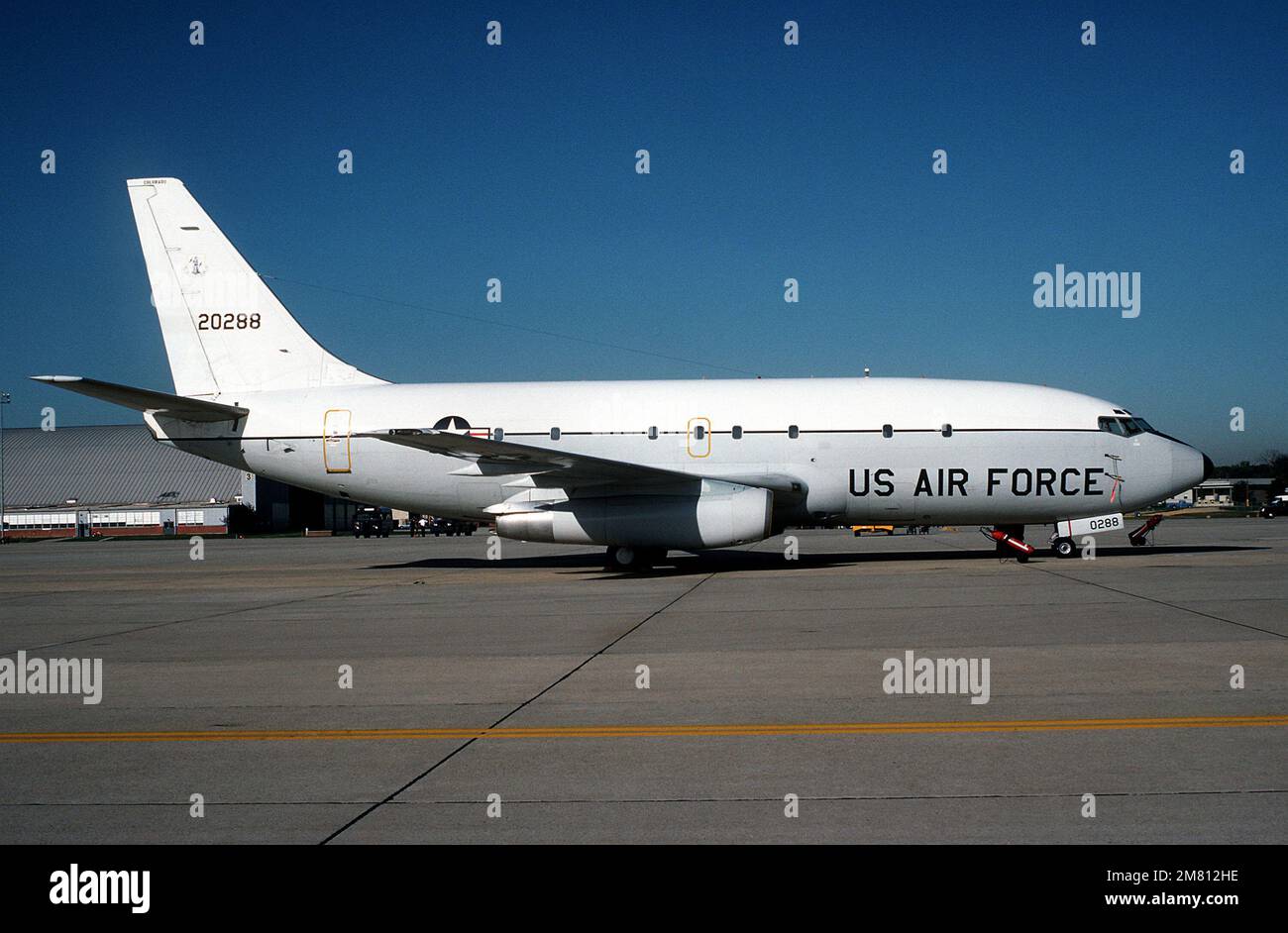 A right side view of a T-43A aircraft parked on the flight line. Base ...