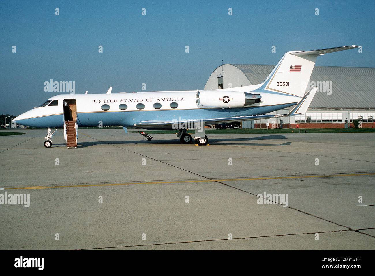A left side view of a C-20A aircraft parked on the flightline. Base ...