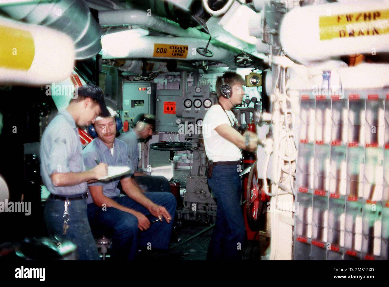An interior view of Main Control (EMO1) in the engine room aboard the ...