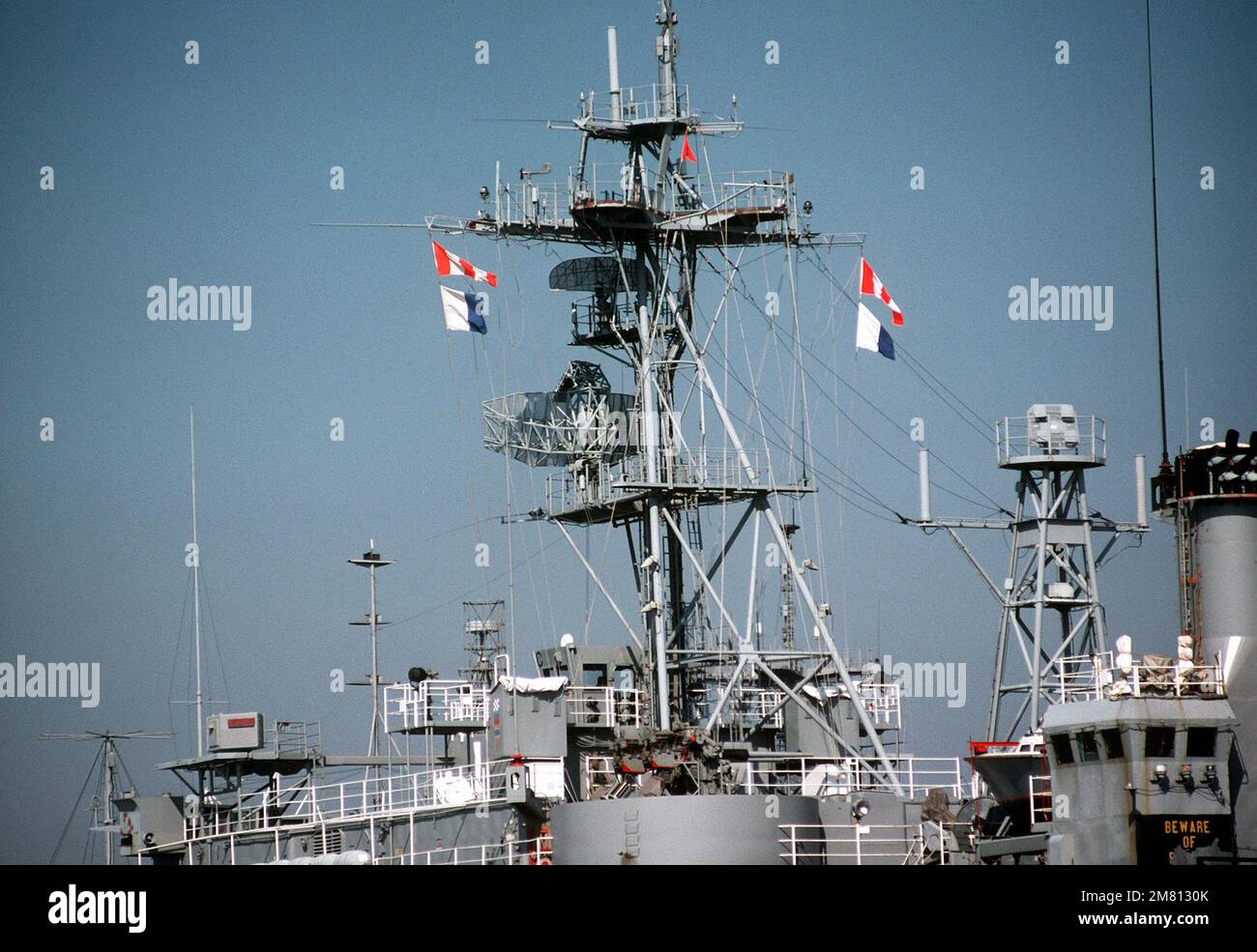 A view of the mast of the amphibious transport dock USS TRENTON (LPD-14 ...
