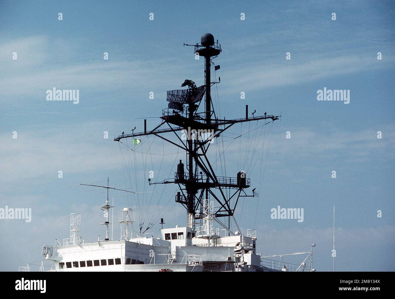 A view of the mast of the amphibious transport dock USS CORONADO (AGF-11) with SPS-40 air search ...