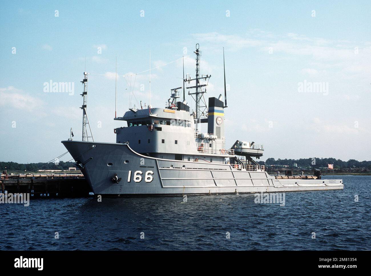 A port bow view of the fleet tug USNS POWHATAN (T-ATF 166) moored at ...
