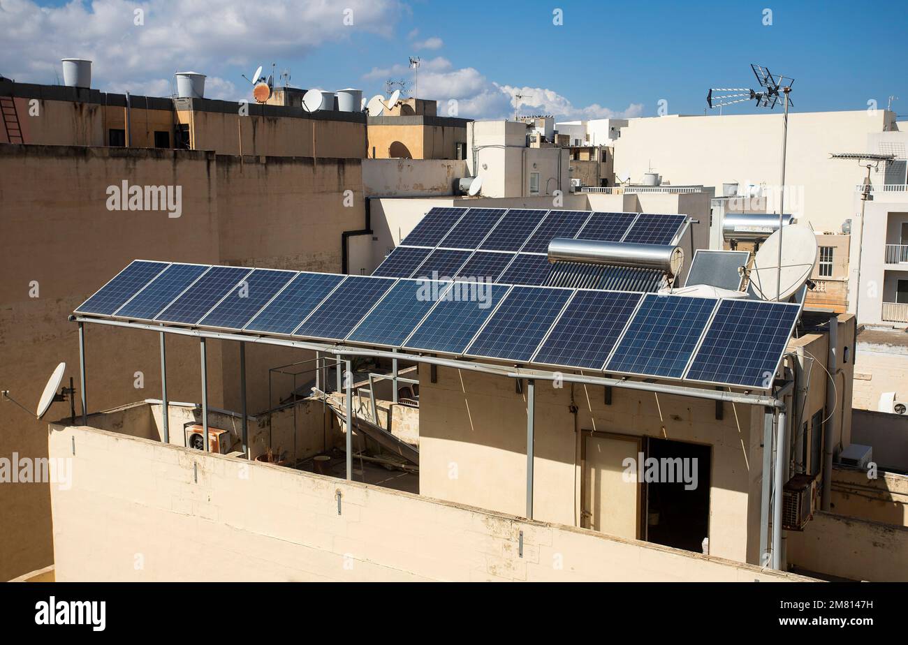 Solar water heater and solar panels on the roof Stock Photo - Alamy